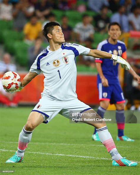 Japanese Goalkeeper Eiji Kawashima Throws The Ball Back Into Play