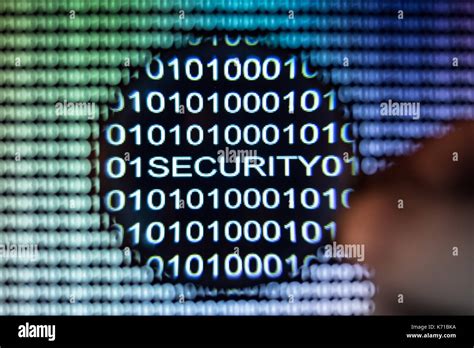 Binary Code Password Security Hand Holding Magnifying Glass Showing