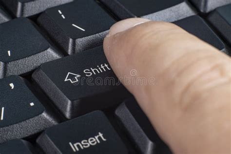 Man Presses The Shift Key On A Black Computer Keyboard Close Up Stock Photo Image Of Button