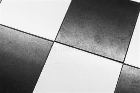 Black And White Checkerboard Floor Pattern In A Modern Interior Space