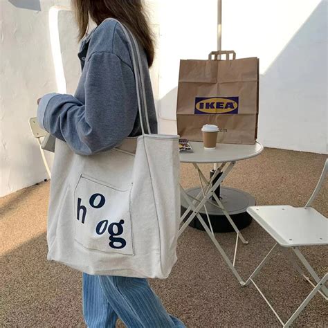 여성용 캔버스 심플 토트백 대용량 쇼퍼백 2022 여성용 숄더백 휴대용 패션 Ins 레터 프린트 디자이너 핸드백