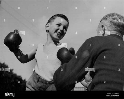 Father And Son Get Together In A Morning Work Out With Boxing Gloves
