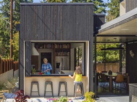 A Clever Pass Through Window Turns This Kitchen Into A Social Hub