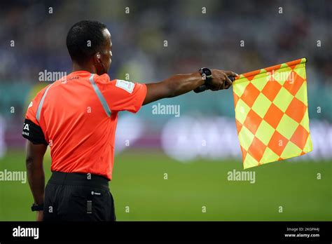 An Assistant Referee Signals Offside During The Fifa World Cup Group E