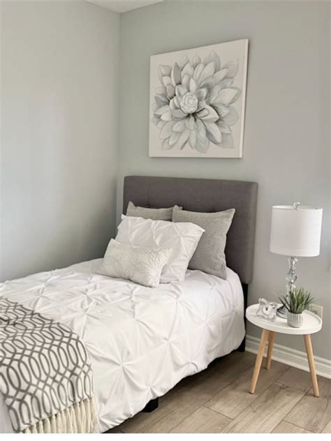 Layered Pillow Arrangement For A Cozy Bedroom