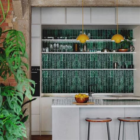 Eight Kitchen Islands That Have Sleek Waterfall Edges