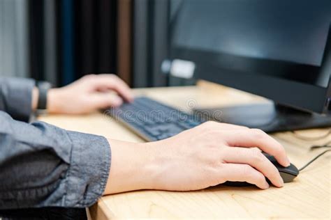 Holding Computer Mouse While Using Computer Stock Photo Image Of Desktop Mouse
