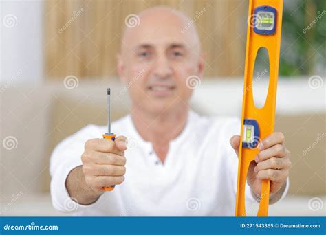 Male Showing Level And Screwdriver Stock Image Image Of Holding