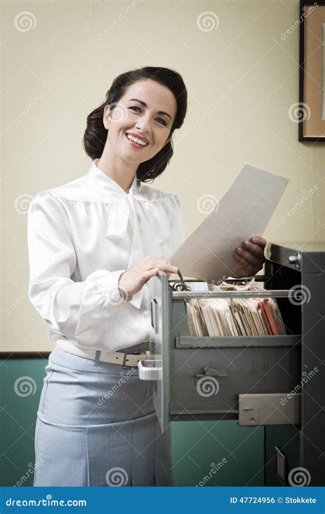 Secretary Searching Files In The Filing Cabinet Royalty Free Stock