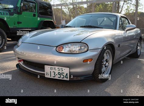 Front View Of A Nice Gray Japanese Light Sports Car The Mazda Miata Mx