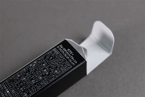 립틴트패키지 제작 깔끔한 먹더블의 홀로그램박이 돋보이는 패키지 박스메이커스 팩토리엠 박스제작 전문업체