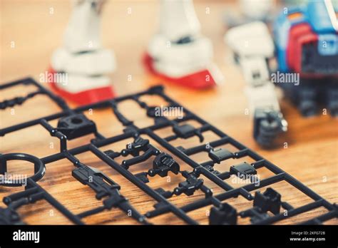 Close Up Black Plastic Sprues Or Injection Moulding Of Model Kit Assembling Model Concept Stock