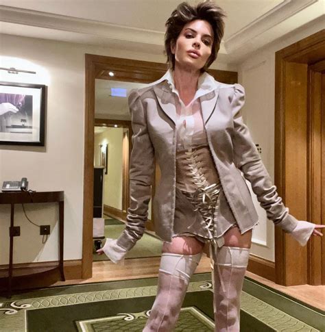 Lisa Rinna Laces Up At London Fashion Week In Corset Thigh Highs