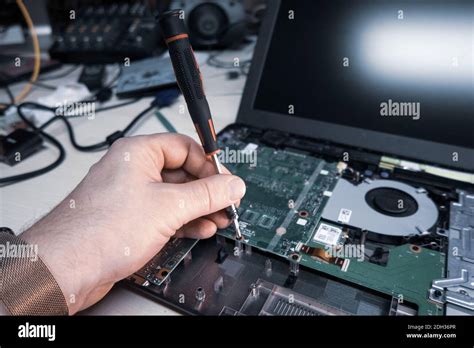 An Opened Notebook Is Repaired In A Computer Workshop Stock Photo Alamy