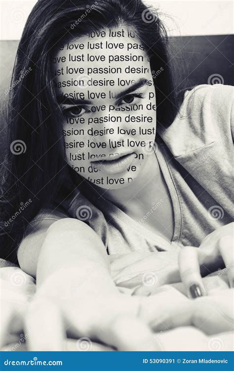 Girl On Bed With Text On Her Face Seducing And Calling Man Stock Image