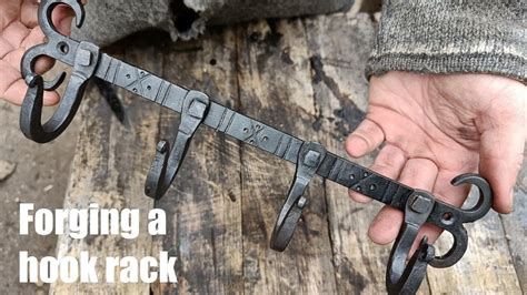 Blacksmithing - Forging a hook rack - YouTube