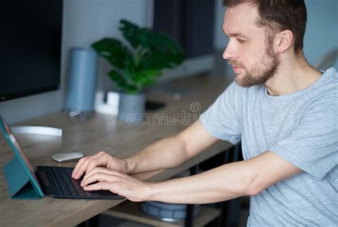 Attractive Bearded Programmer Or Software Developer Working In Office