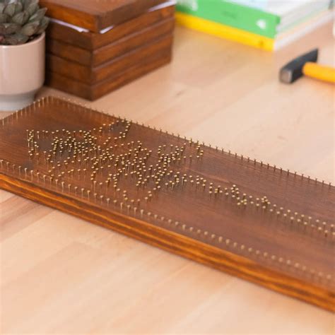 beginner friendly pine tree string art pattern for home decor
