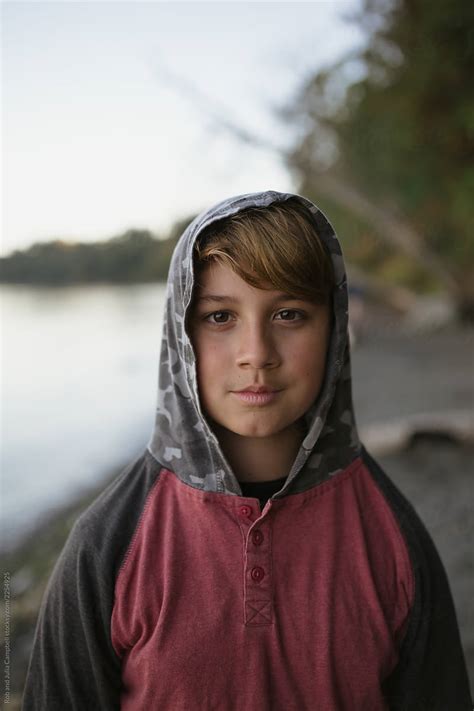 Serious Boy Outside By Stocksy Contributor Rob And Julia Campbell
