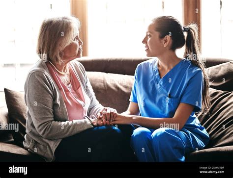 They Have A Special Connection A Nurse Holding A Senior Womans Hands