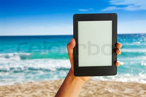 Man Hand Holding Electronic Device For Reading Stock Image Colourbox