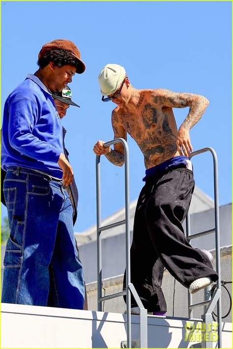 Justin Bieber Goes Shirtless As Hangs Out On Rooftop With Friends