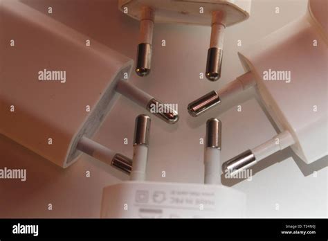 USB Mobile Phone Chargers Of Different Types Touch Each Others Pins Stock Photo Alamy