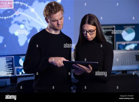 Focused Professional Cyber Security Team Working To Prevent Security Threats Find Vulnerability