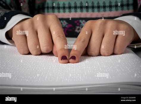 Blind Woman Reading Text In Braille Language Stock Photo Alamy
