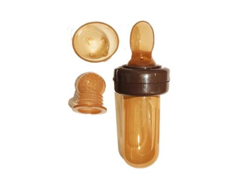 مشخصات،قیمت و خرید سرلاک خوری و میوه خوری پستانکی نوزادی درپوش دار طرح