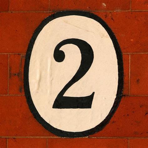 Number 2 Sign On Red Brick Wall