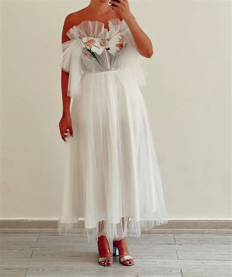 پیراهن عروس با اپلیکه گل نارنجی حبرات