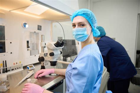 Adult Embryologist Preparing Lab Equipment For A Procedure Stock Image