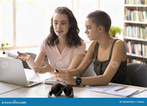 Confident Pretty College Achiever Girl Helping Classmate With Assignment Stock Image Image Of