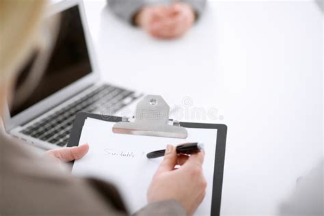Interview Close Up Of Three Businesswoman Around The Table During Job Interview Stock Photo