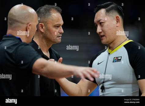 New Zealands Coach Judd Flavell Center Talks With The Referee During