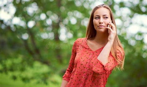 Staying Connected Wherever She Goes A Young Woman Talking On Her