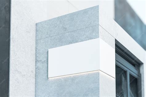 Premium Photo Blank White Signage With Backlight On The Corner Of