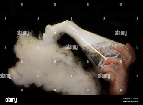 Glass Flask With Puffs Of Smoke As A Result Of Liquid Nitrogen Reaction