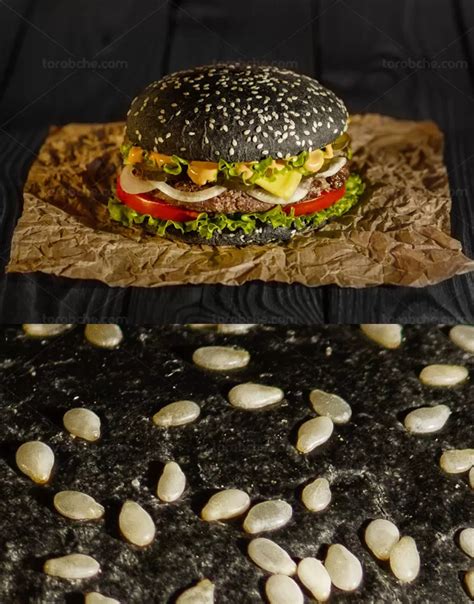 عکس با کیفیت همبرگر با نان مشکی کنجدی گرافیک با طعم تربچه