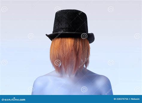 A Faceless Incognito Woman Woman In Black Hat With Facial Hair Stock