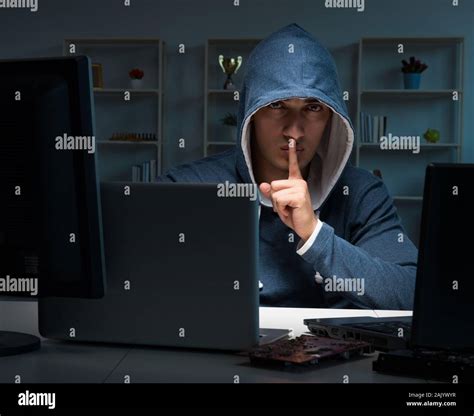 The Hacker Hacking Computer At Night Stock Photo Alamy