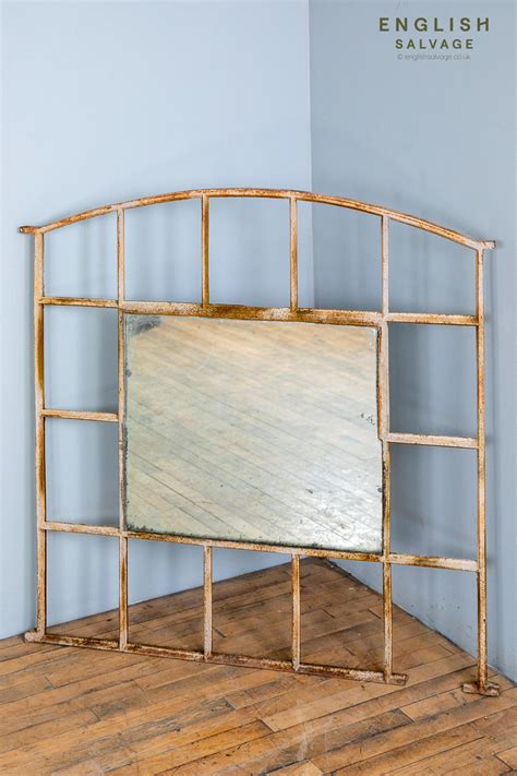 old cast iron window with mirror section