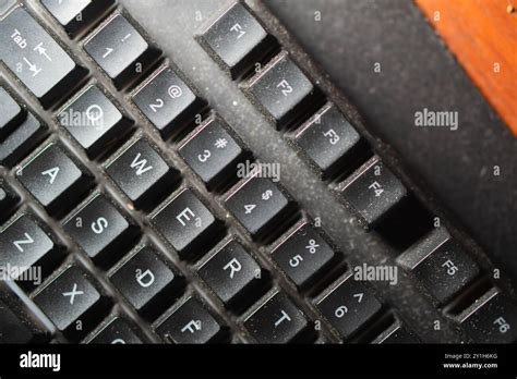 close up view of a black computer keyboard with various function keys