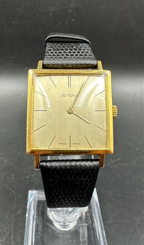 A Juvenia Mfg 18ct Gold Watch On Leather Strap And In Original Box