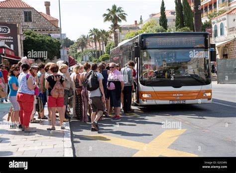 Dubrovnik Bus Service Croatia Passengers Queue And Board A Local