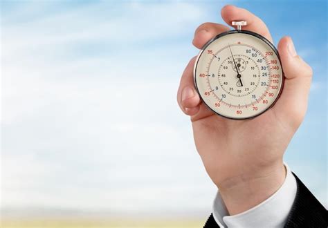 Premium Photo Hand And Stopwatch