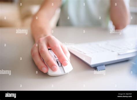 Close Up Hand Man Using Mouse And Computer At Home Stock Photo Alamy