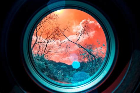 Infrared Photography A Circular Window Frame That Looks Out Onto A