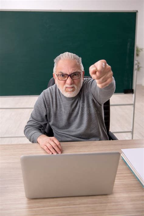 Old Male Teacher In The Classroom Stock Photo Image Of Book Angry